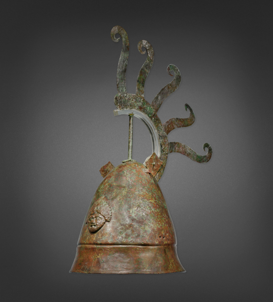 A GREEK BRONZE PILOS HELMET WITH A RADIATING CREST