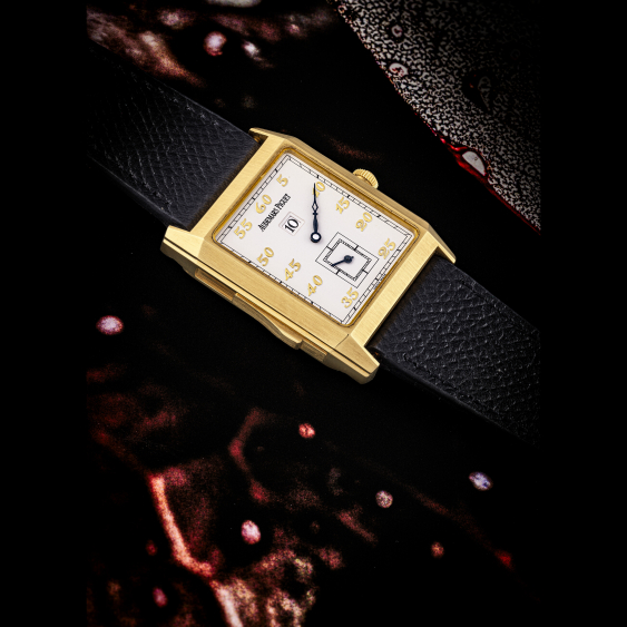 AUDEMARS PIGUET. A RARE 18K GOLD RECTANGULAR MINUTE REPEATING JUMP HOUR ...