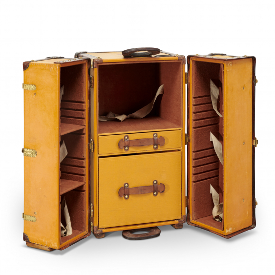 A YELLOW VUITTONITE CANVAS LIBRARY TRUNK WITH BRASS HARDWARE