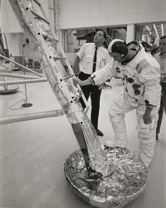 NEIL ARMSTRONG DESCENDS LADDER OF LUNAR MODULE TRAINING SPACECRAFT ...