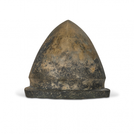 AN ETRUSCAN BRONZE HELMET OF NEGAU TYPE