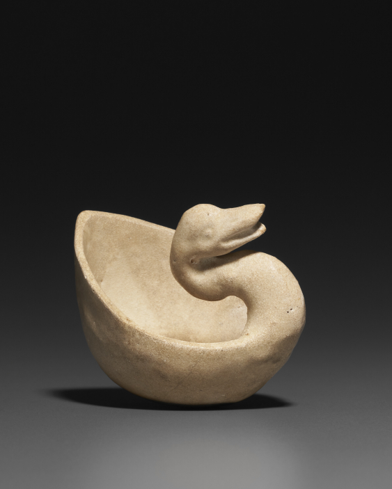 A RARE CREAM-GLAZED GOOSE-FORM CUP