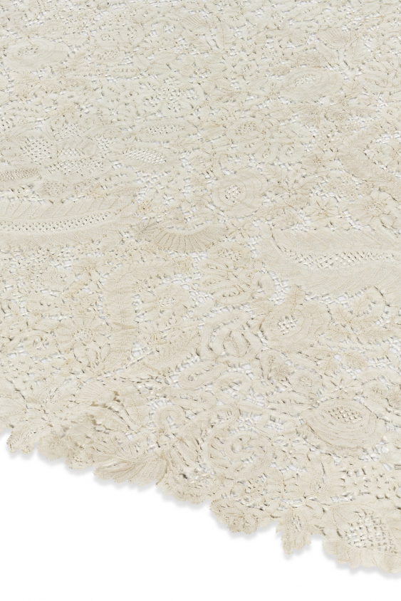 AN ENGLISH HONITON LACE TRIANGULAR SHAWL