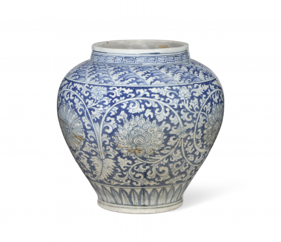 A RARE CHINESE REVERSE-DECORATED BLUE AND WHITE JAR