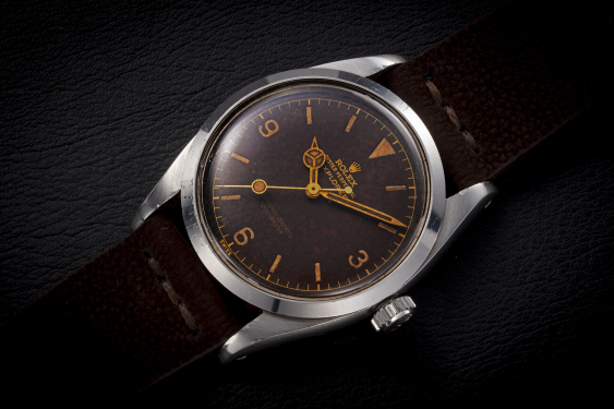 ROLEX, EXPLORER REF. 6610 ‘TROPICAL’, A STEEL AUTOMATIC WRISTWATCH