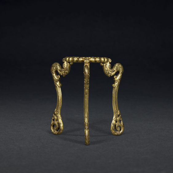 A RARE GILT-BRONZE TRIPOD OFFERING STAND