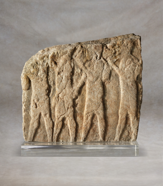 AN ASSYRIAN GYPSUM RELIEF FRAGMENT