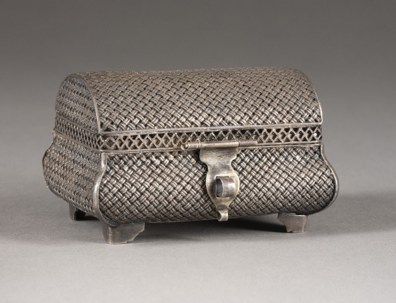 A SILVER TROMPE L'OEIL CASKET Russian, Moscow, 1863 Of r