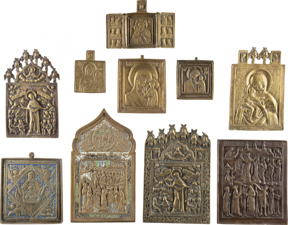 NINE BRASS ICONS AND A TRIPTYCH SHOWING THE IMAGES OF TH