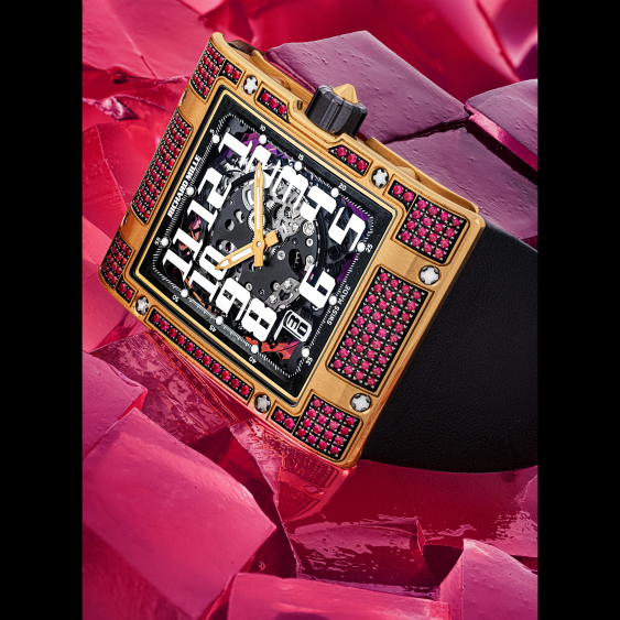 RICHARD MILLE. A RARE 18K PINK GOLD AND RUBY-SET AUTOMATIC SEMI ...